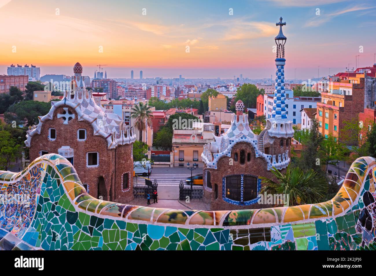 Barcelona city view from Guell Park. Sunrise view of colorful mosaic ...