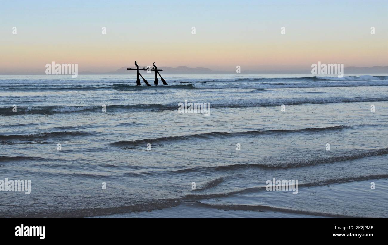 Landscape a beautiful sunrise over the beach in Strand and the False ...