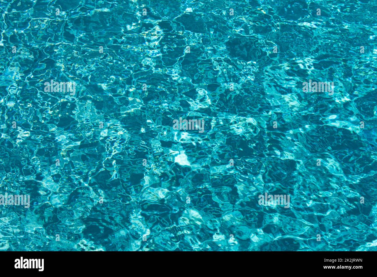 Water background. Blue water, ripples and highlights. Texture of water ...