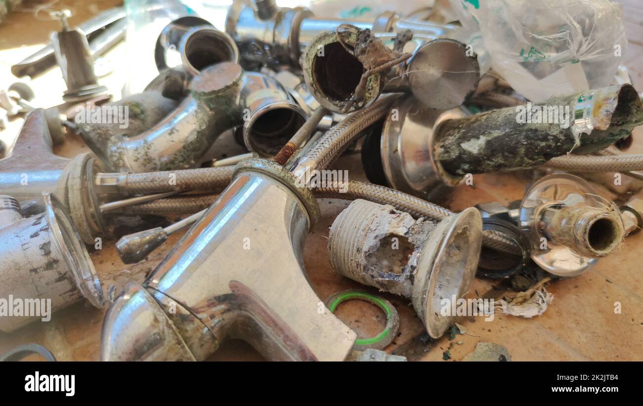 replacement of old water faucets Stock Photo - Alamy
