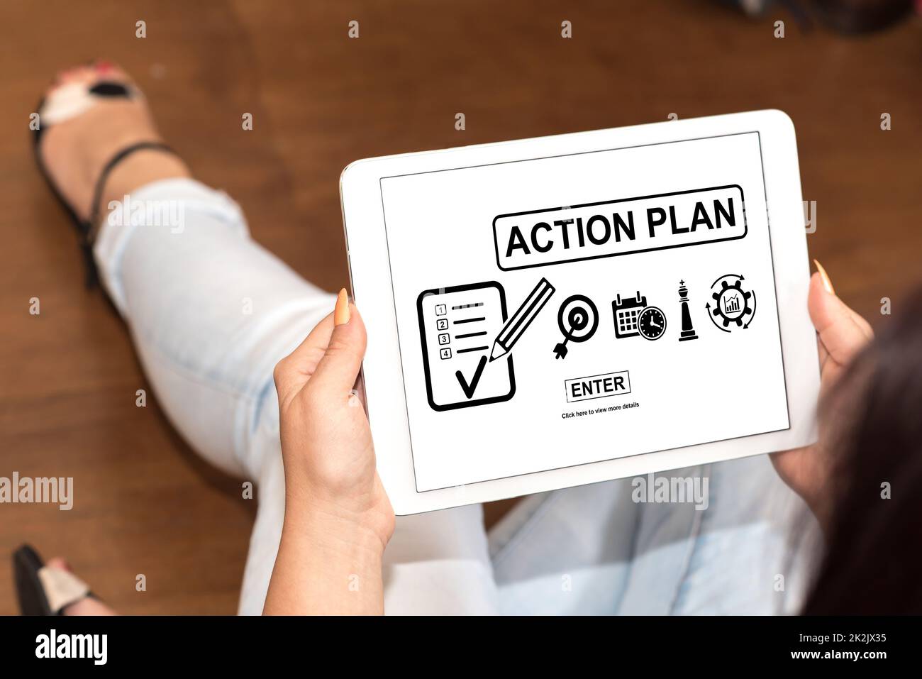 Tablet screen displaying an action plan concept Stock Photo - Alamy