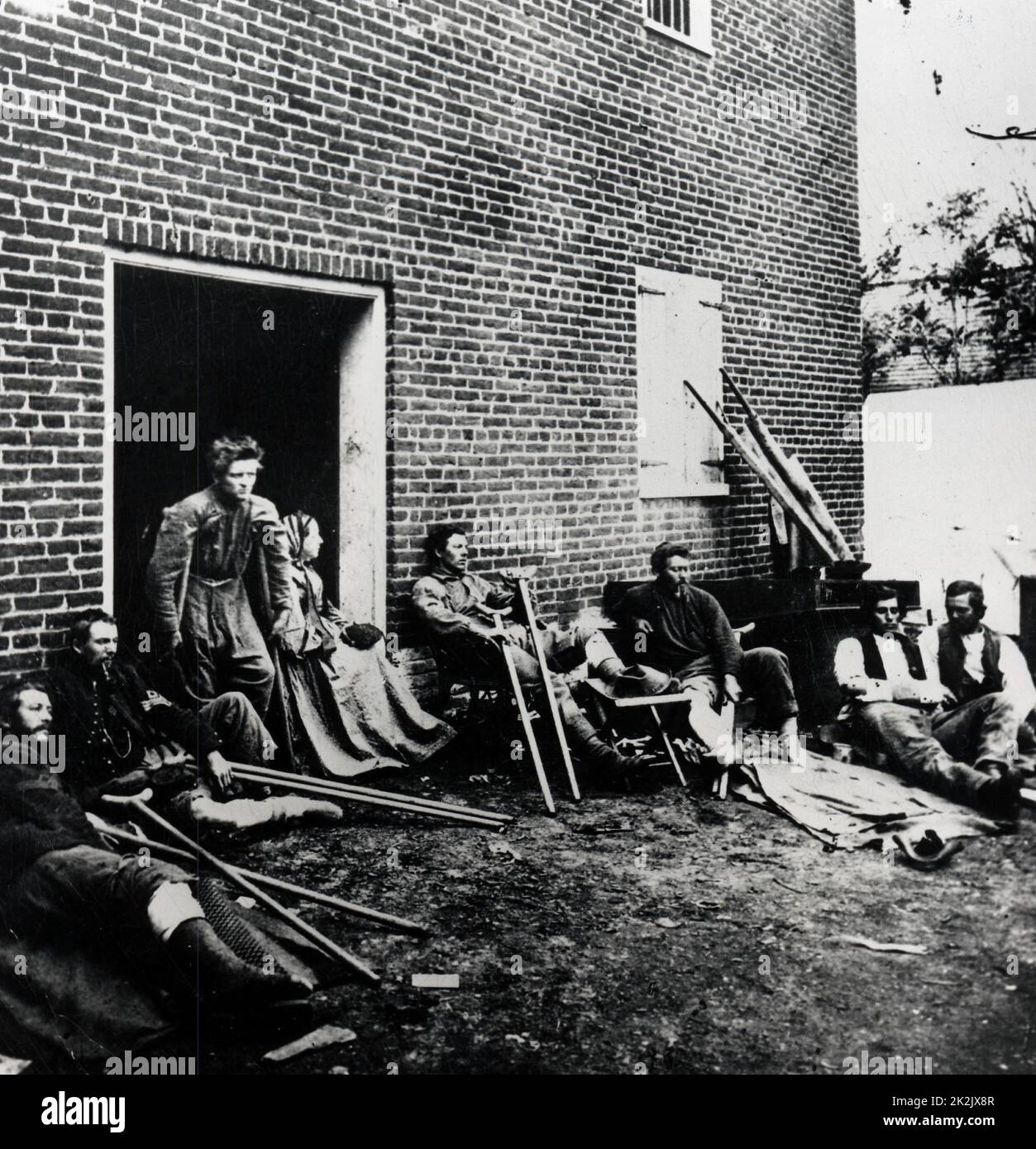 American Civil War: Wounded soldiers in care of the Red Cross sitting ...
