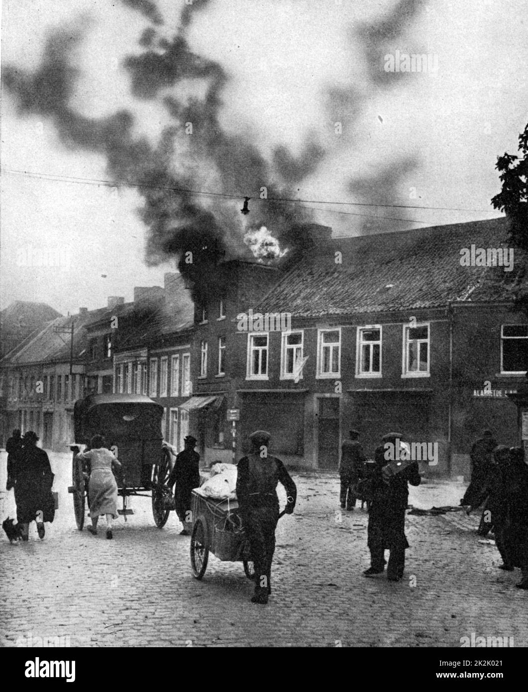 A German raid on a Belgian town: residents leaving with everything they ...