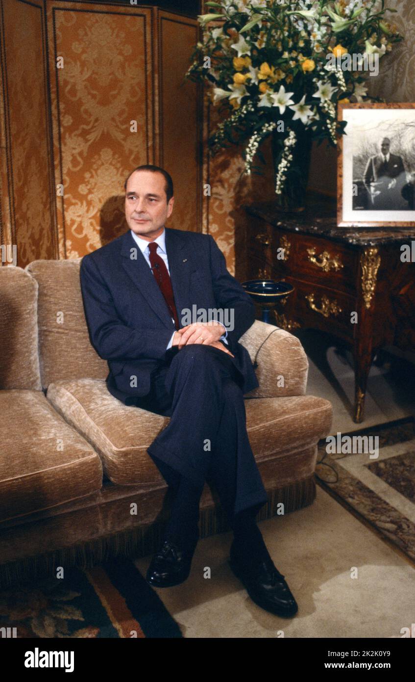 Jacques Chirac, then Prime Minister, posing in Matignon. On the right ...