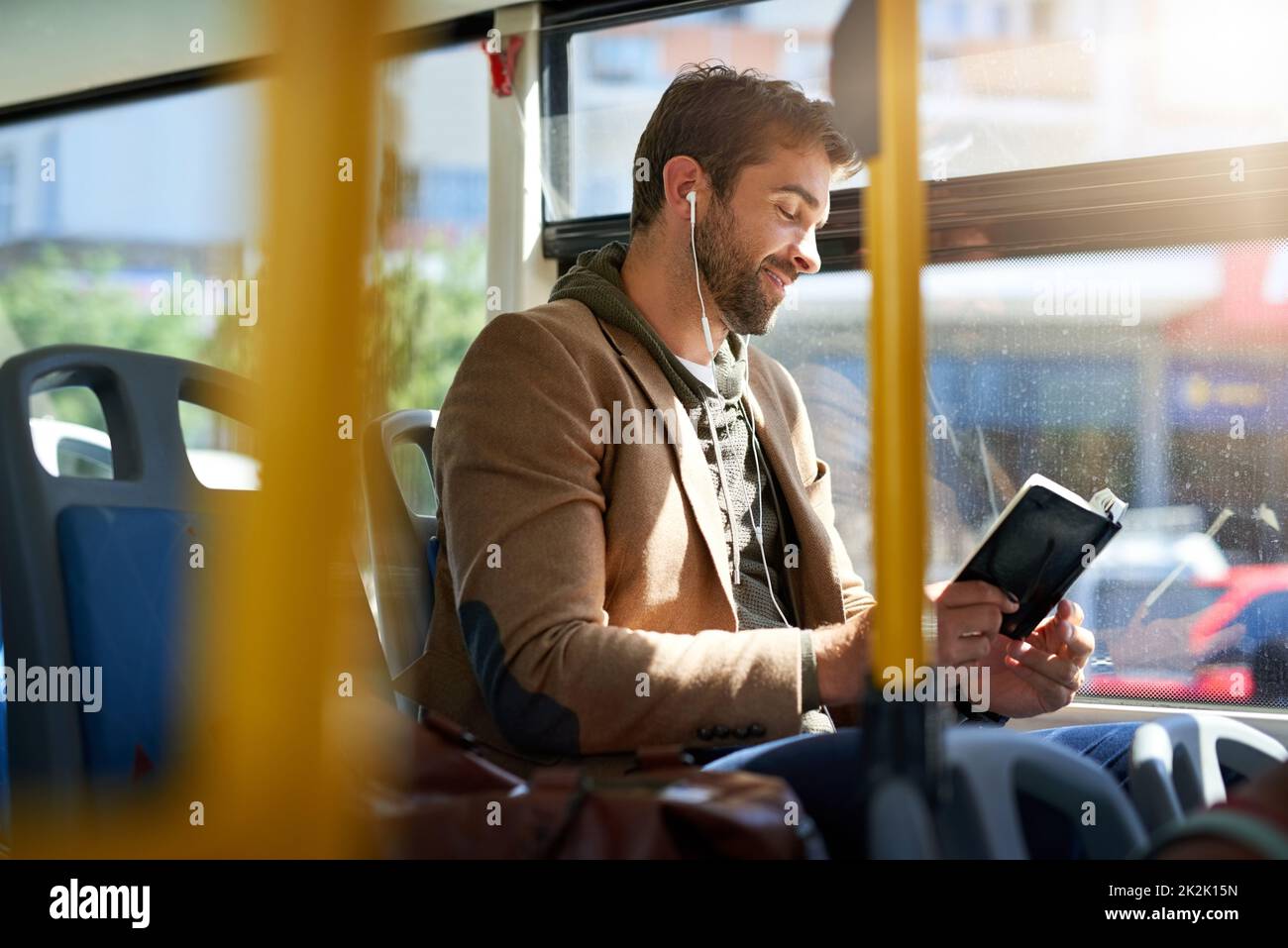 Checking out the best tourist spots. Cropped shot of a handsome young ...