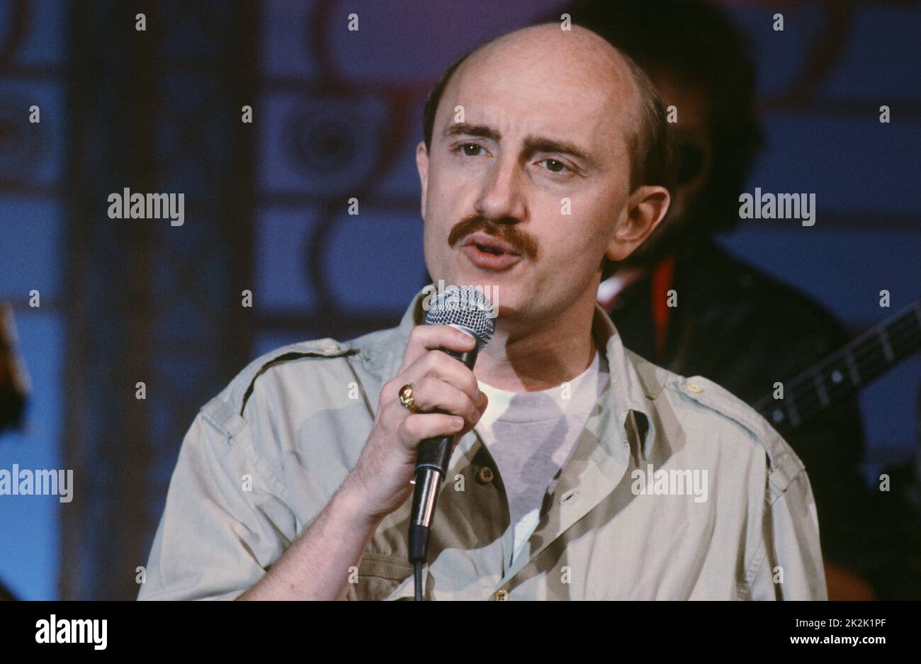 French actor Michel Blanc performing "Marche à l'ombre" on the set of ...