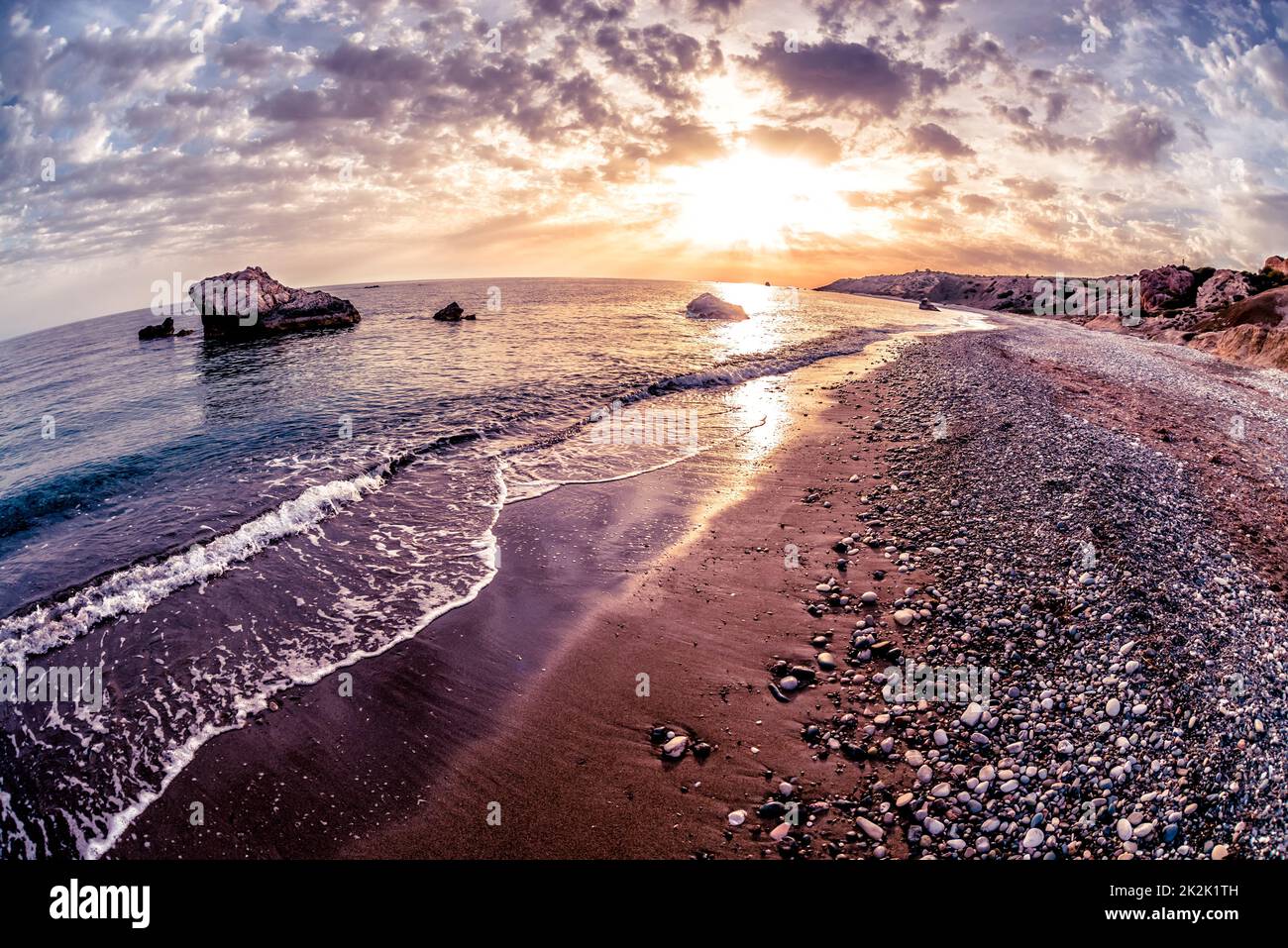 Seascape sunset near Petra tou Romiou. Paphos District, Cyprus Stock ...
