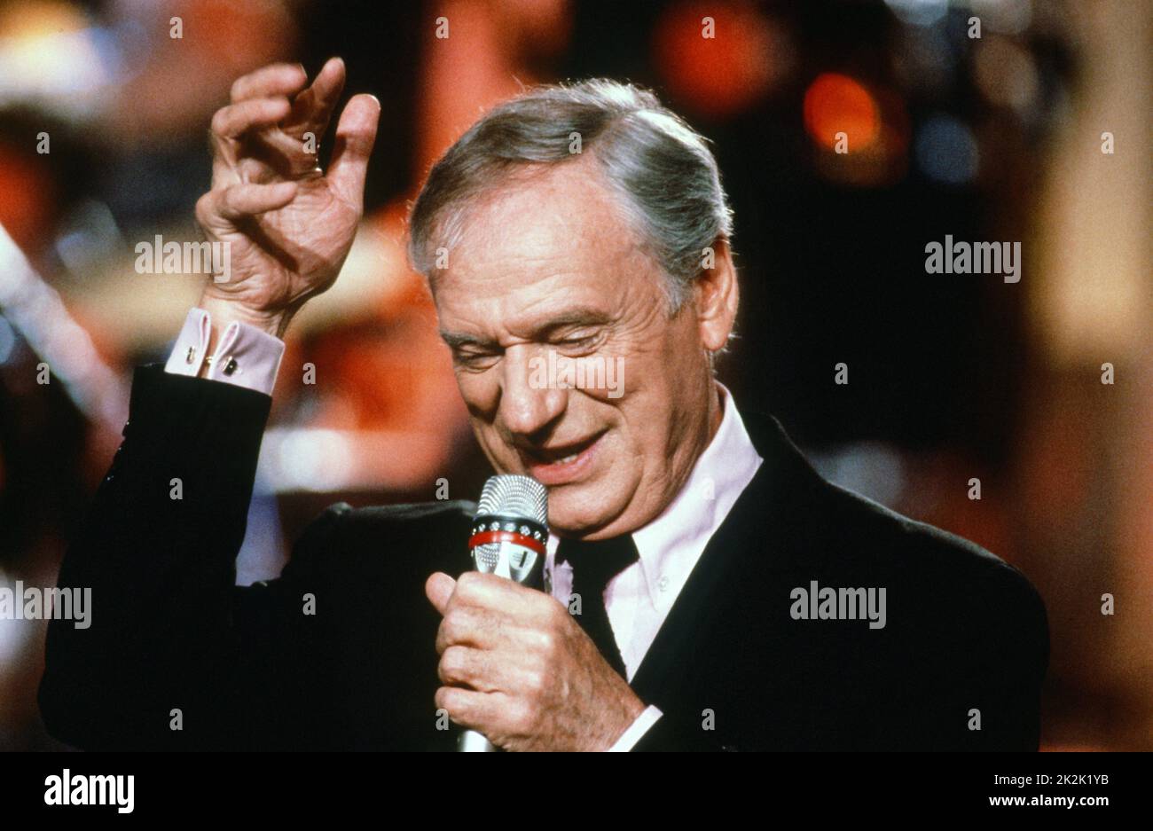 French actor Yves Montand, attending the TV show 'Champs Elysées' on ...