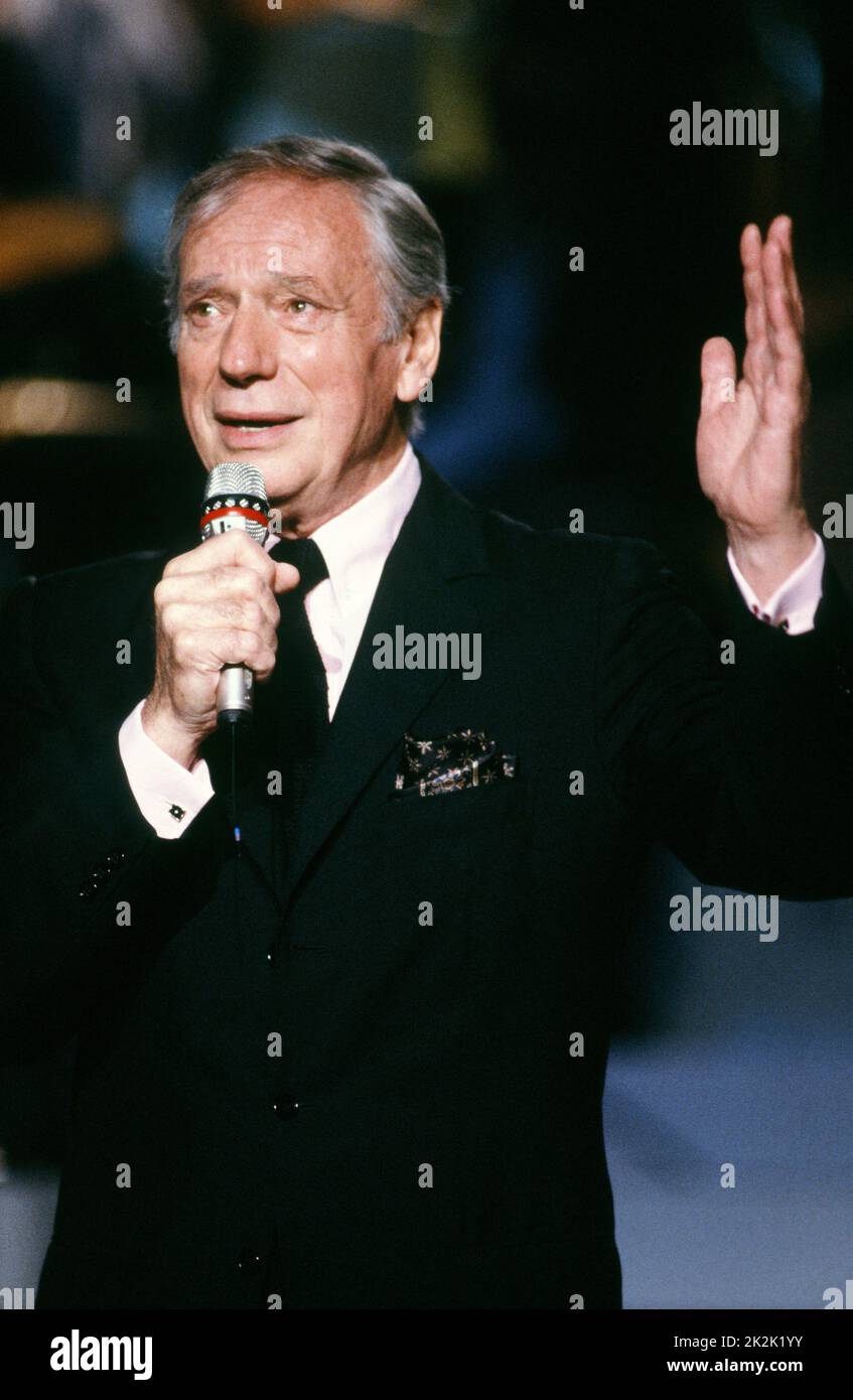 French actor Yves Montand, attending the TV show 'Champs Elysées' on ...