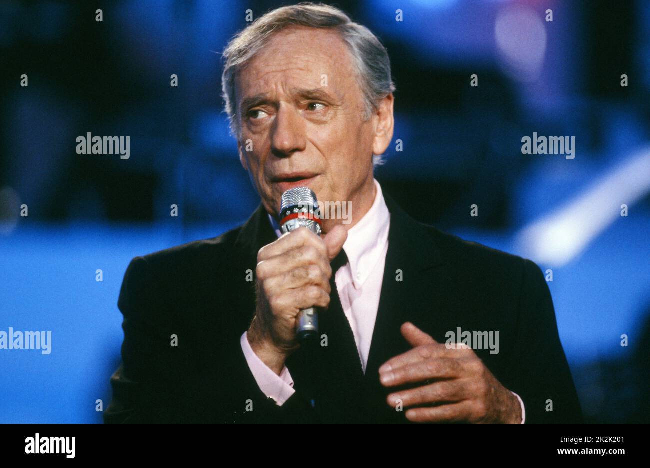 French actor Yves Montand, attending the TV show 'Champs Elysées' on ...