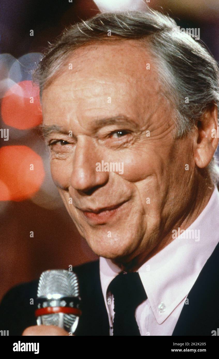 French actor Yves Montand, attending the TV show 'Champs Elysées' on ...