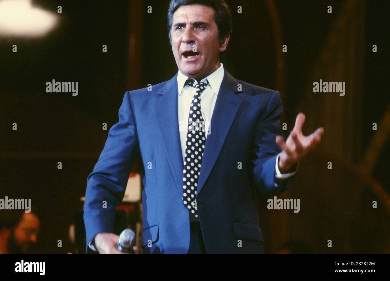 French singer Gilbert Bécaud performing at the Paris Olympia, during ...