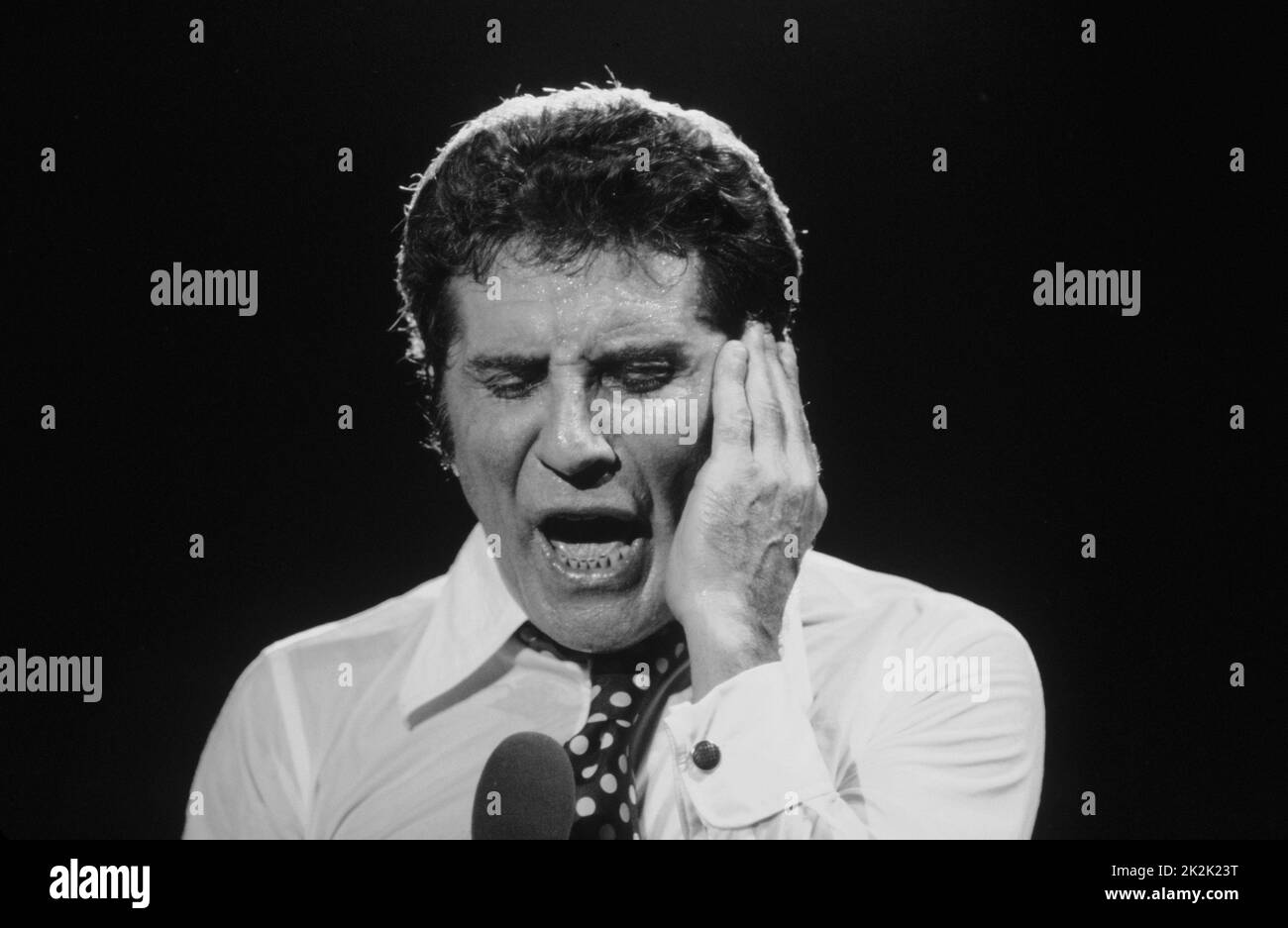 French singer Gilbert Bécaud performing at the Paris Olympia, during ...