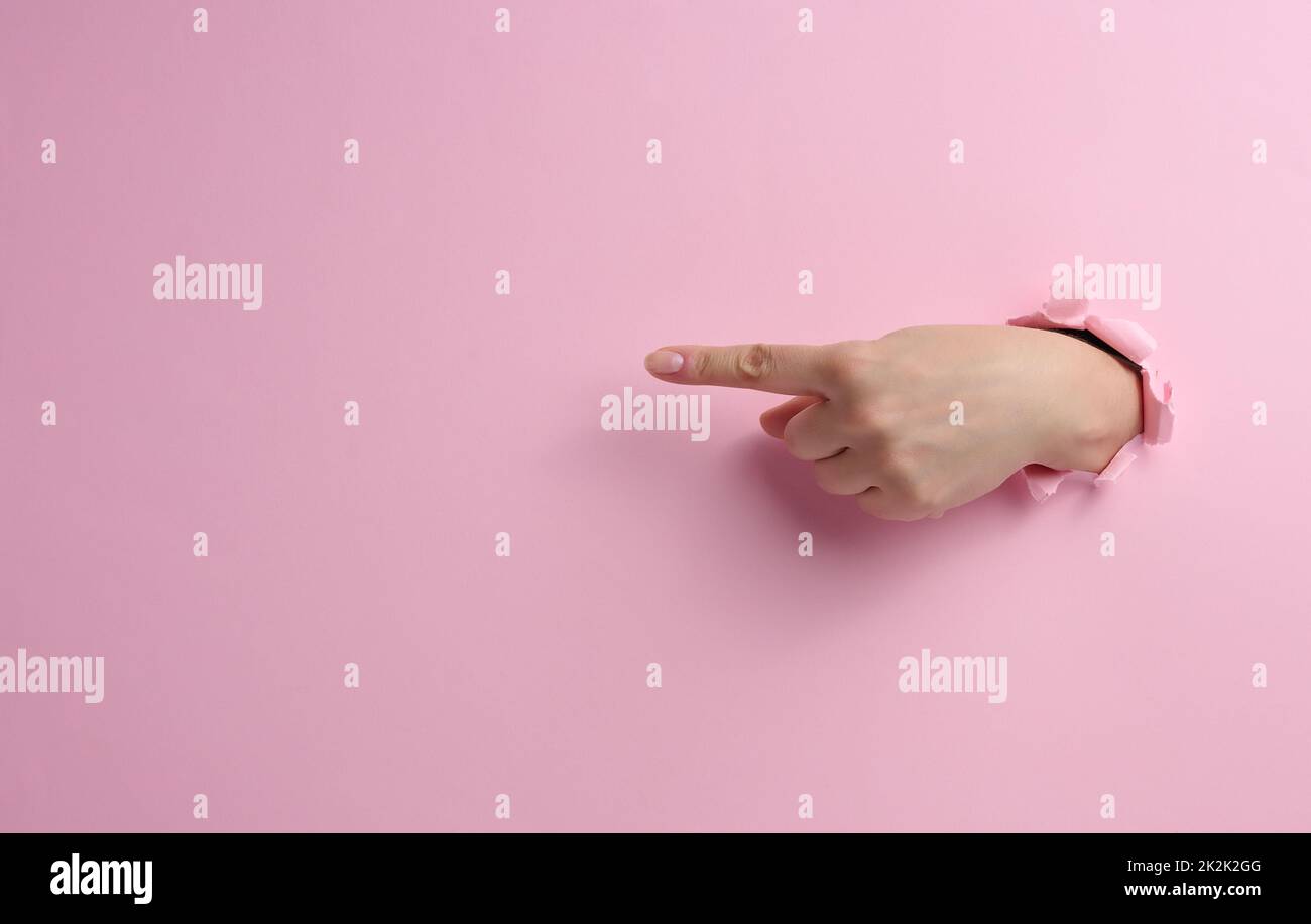 Hand showing index finger female hi-res stock photography and images ...