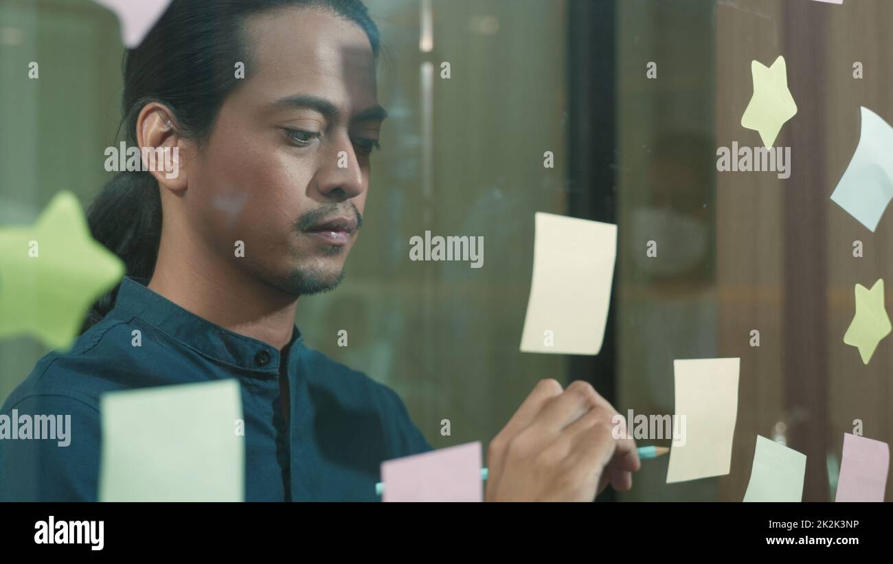 Student sticking adhesive notes hi-res stock photography and images - Alamy