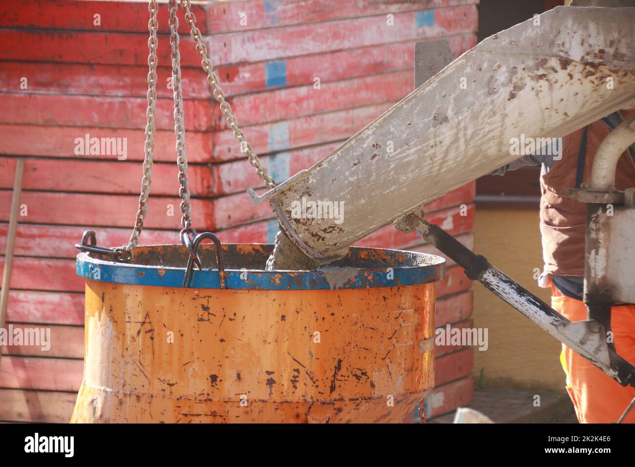 Filling a concrete silo with liquid concrete Stock Photo - Alamy