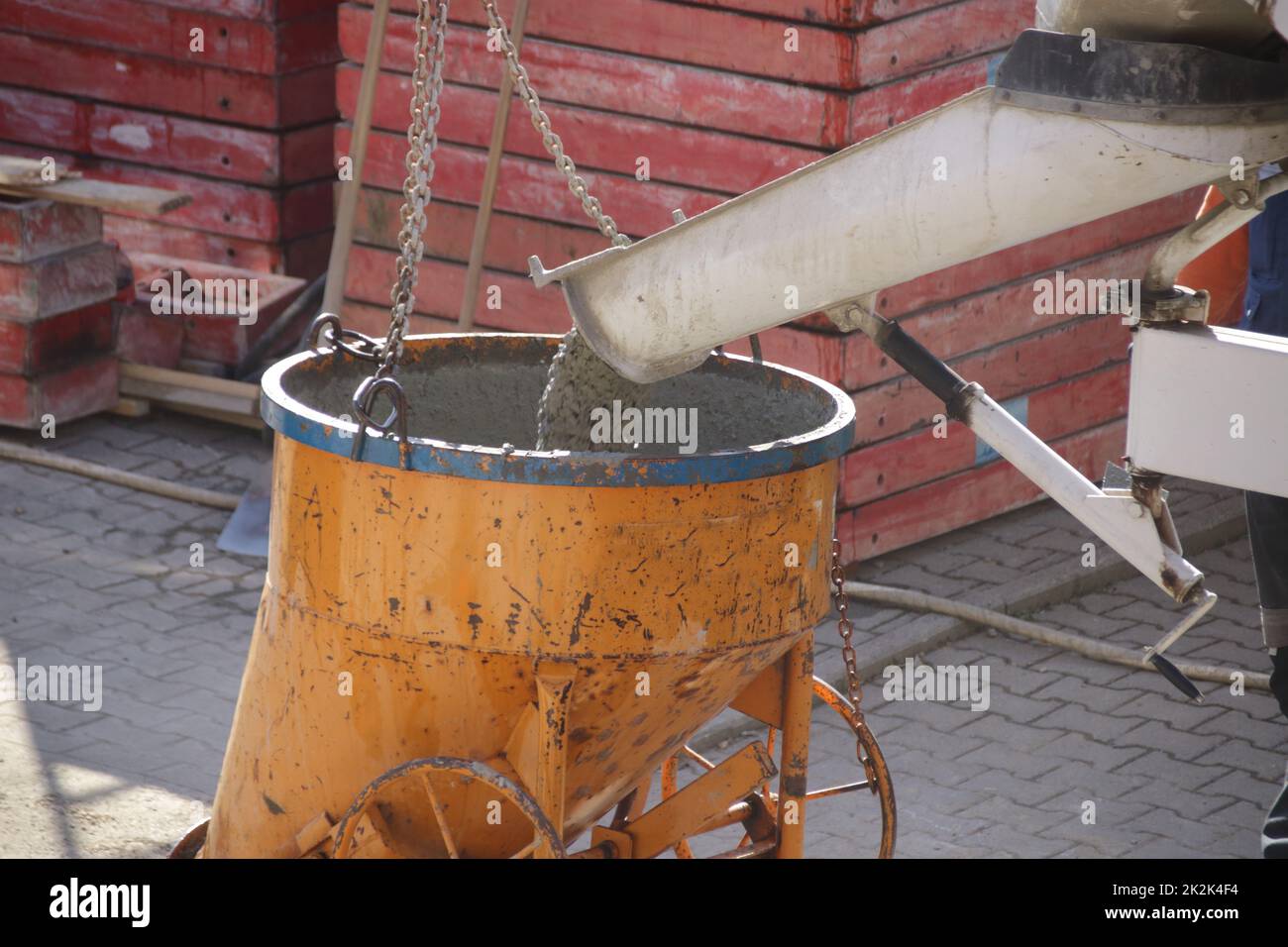 Filling a concrete silo with liquid concrete Stock Photo - Alamy