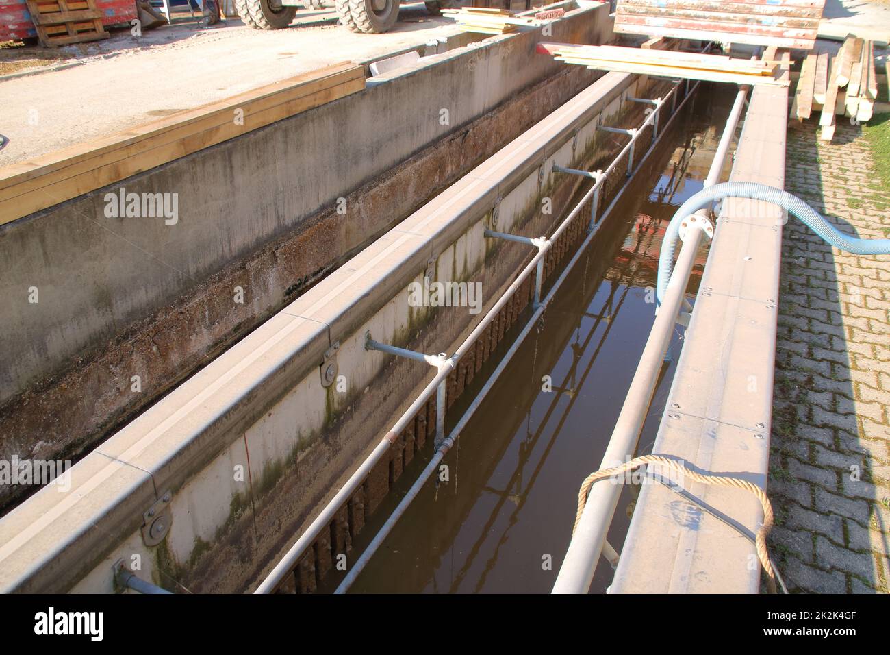 The water was pumped out in the sand trap in a sewage treatment plant ...