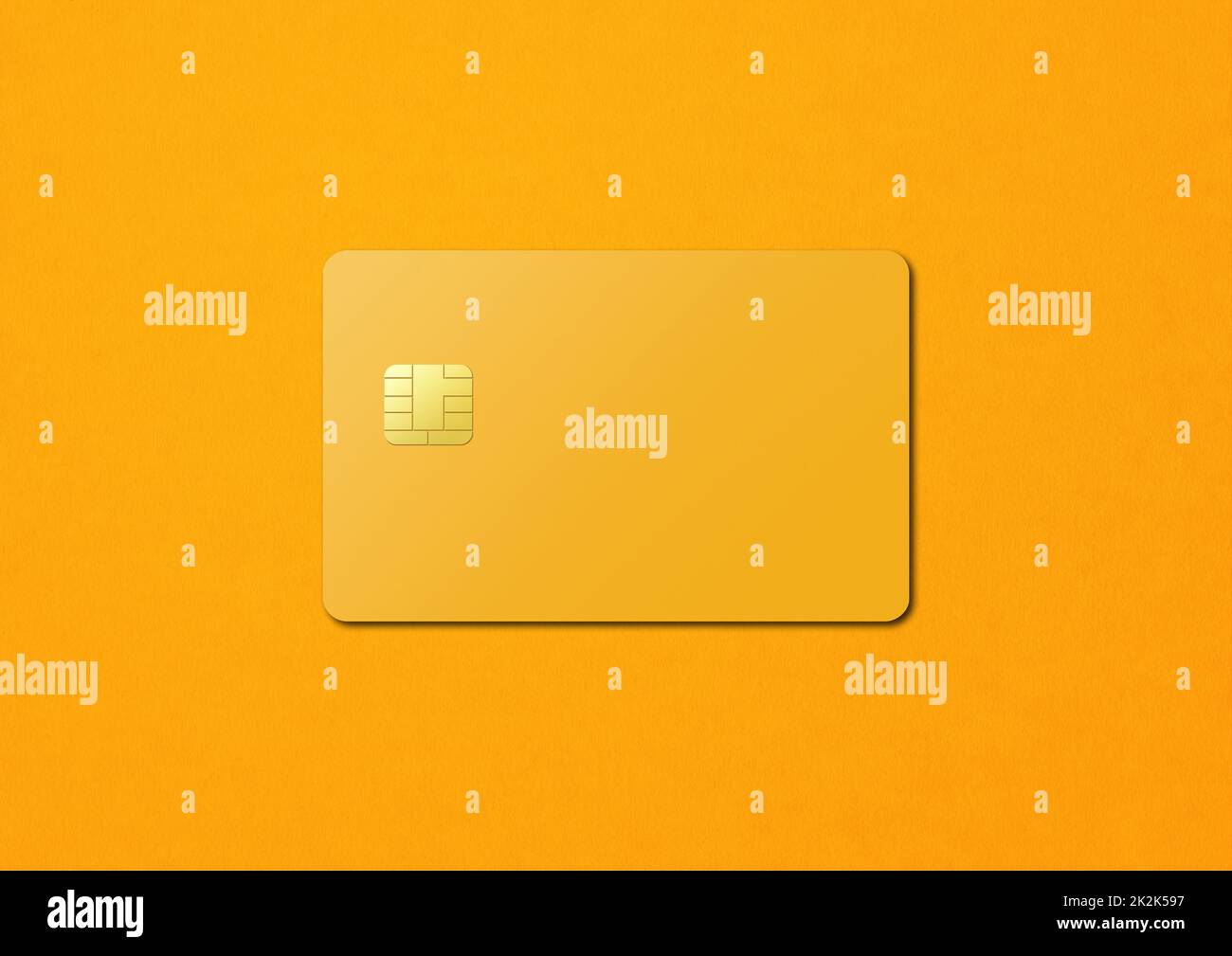 Yellow credit card on a color background Stock Photo - Alamy
