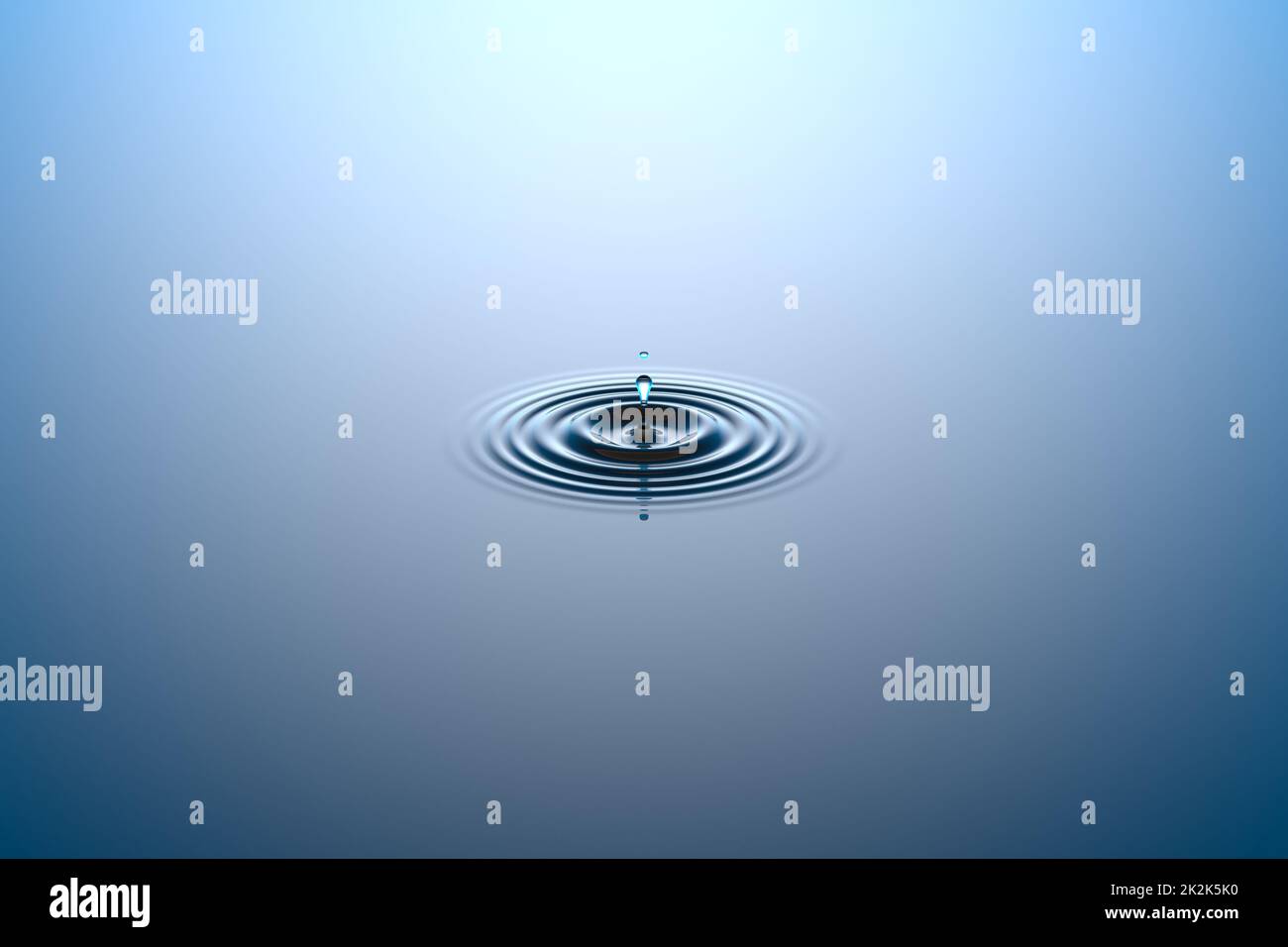 Water drop falling into water surface Stock Photo - Alamy