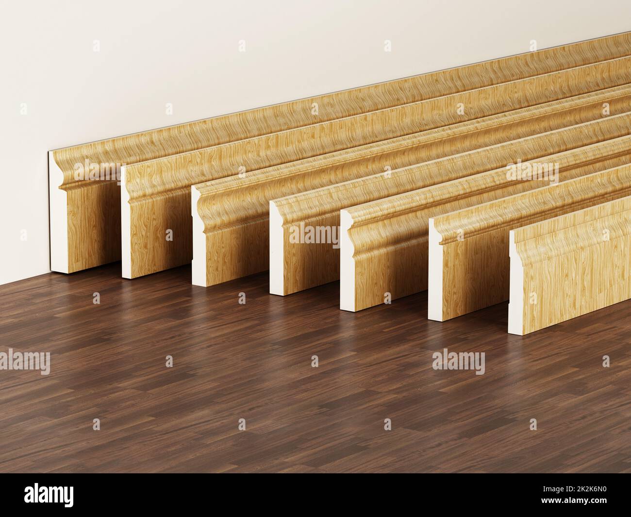 Baseboards with various profiles standing on hardwood surface. 3D ...