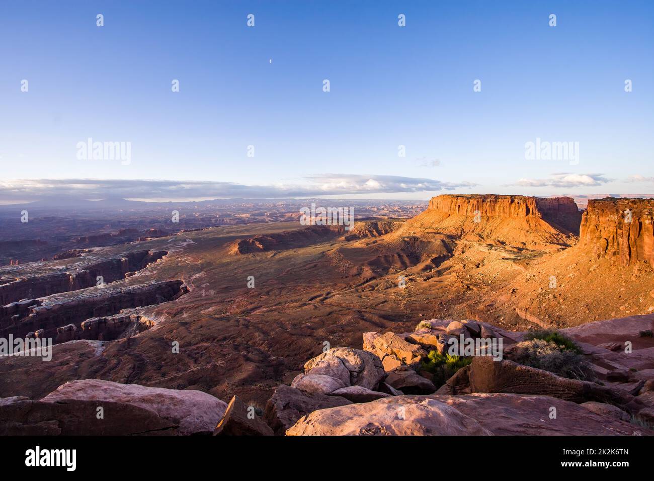Moon over Canyonlands National Park with Junction Butte at right ...