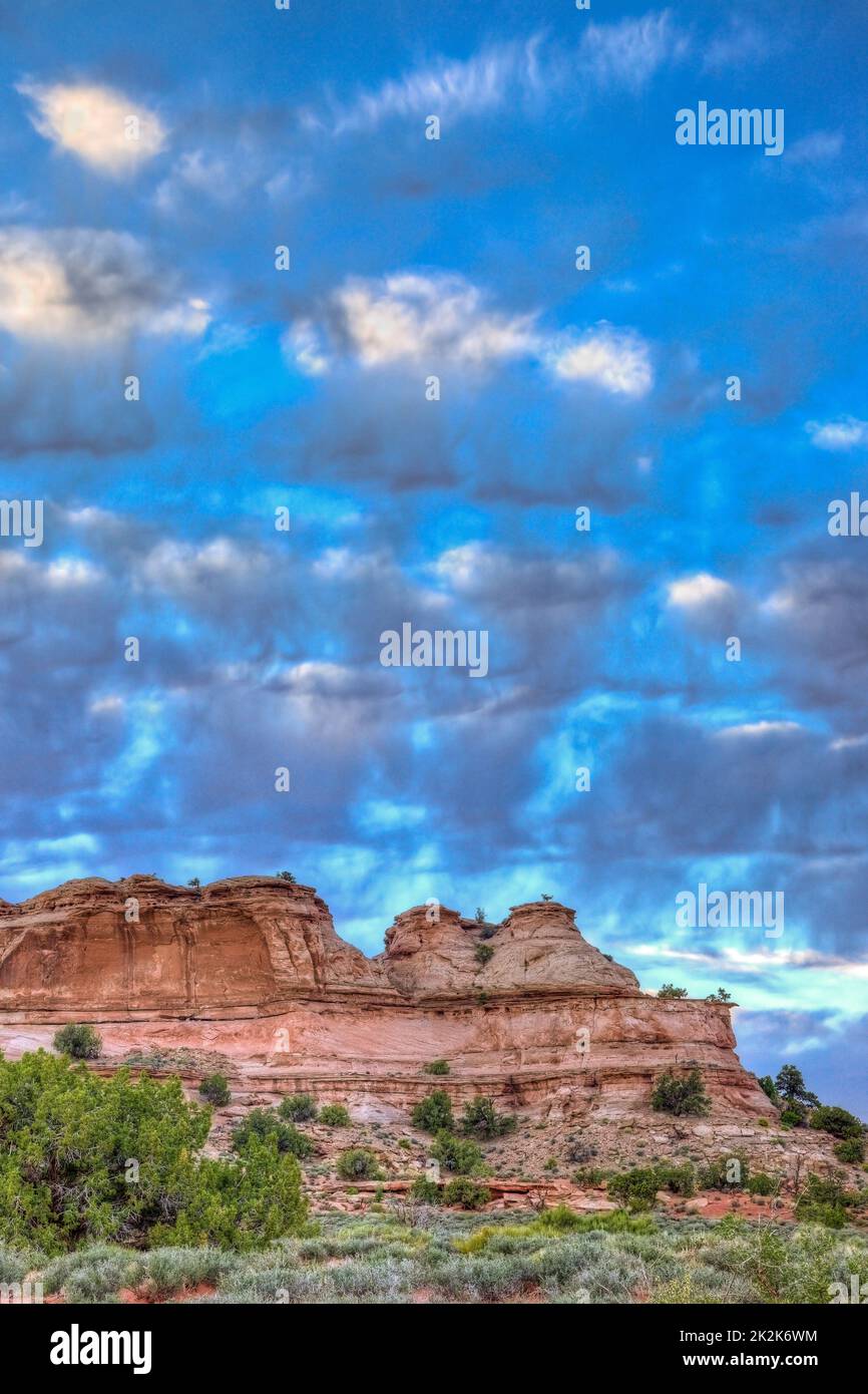 Sandstone rock formations with buttermilk clouds overhead at the Green ...
