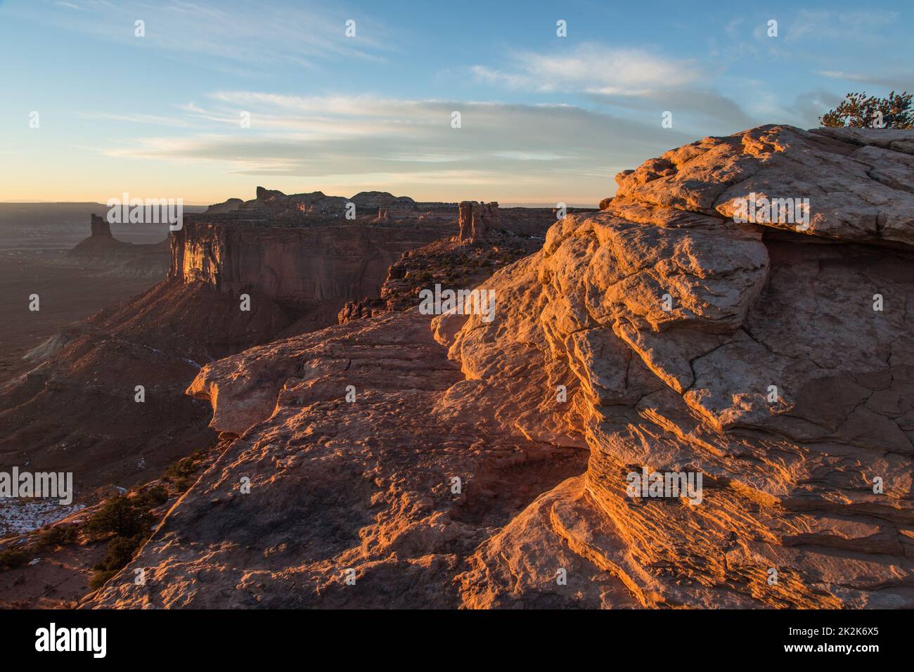 Sunset on eroded Kayenta sandstone with the Candlestick Tower & Green ...