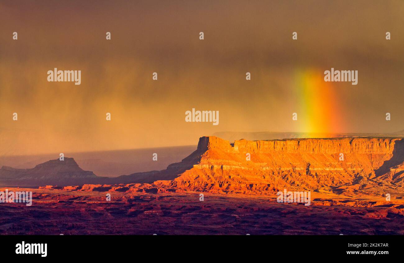 Storm with a rainbow over Canyonlands National Park, Moab, Utah. View ...