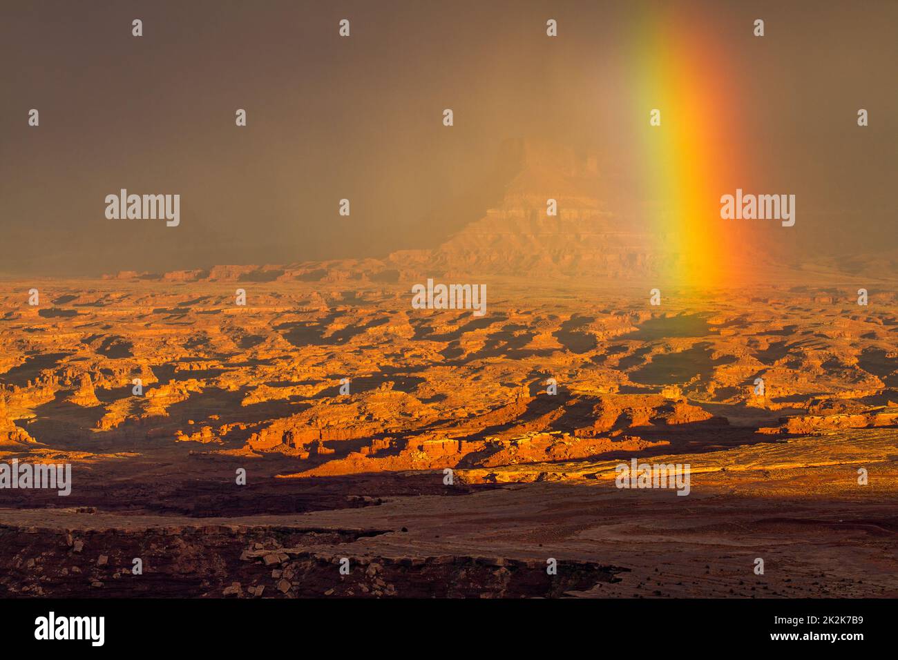 Storm with a rainbow over Canyonlands National Park, Moab, Utah. View ...
