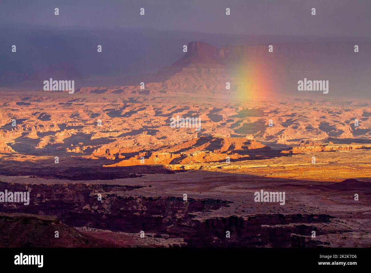 Storm with a rainbow over Canyonlands National Park, Moab, Utah. View ...