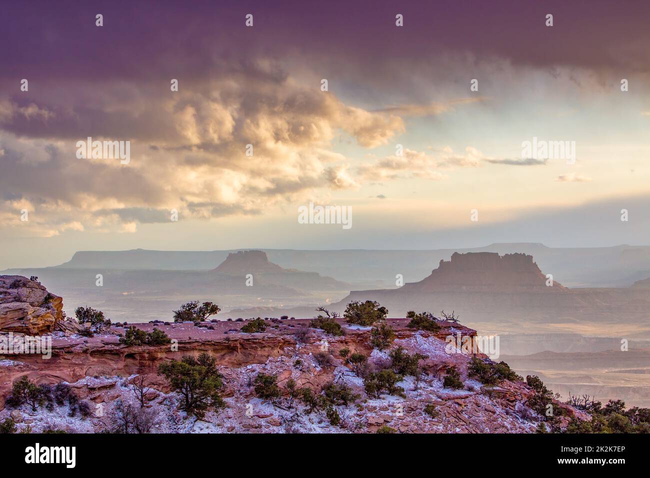 Storm clouds over Elaterate Butte, left, and Ekker Butte, right, from ...