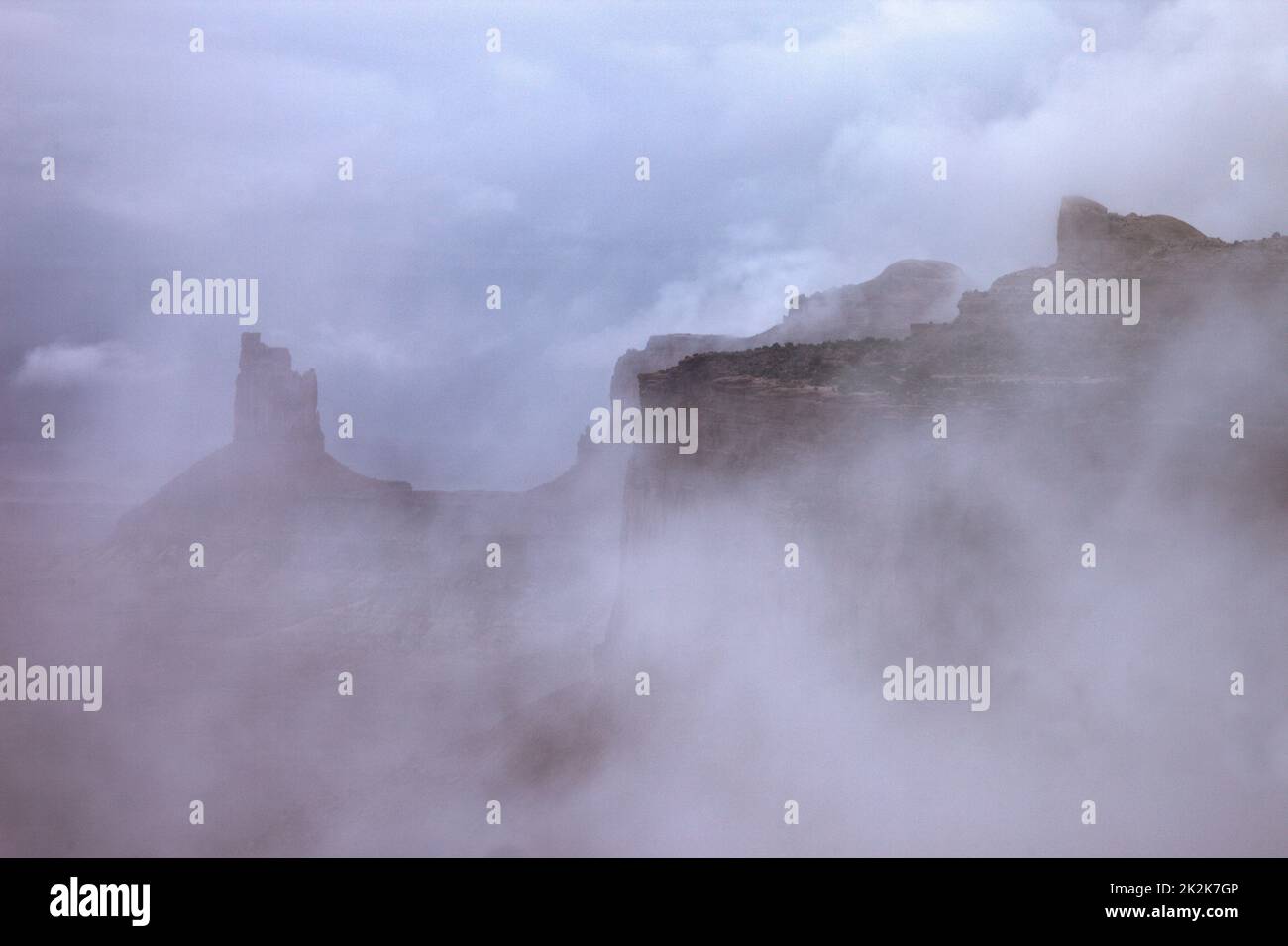 Low clouds around the Candlestick Tower and the Green River Overlook in ...
