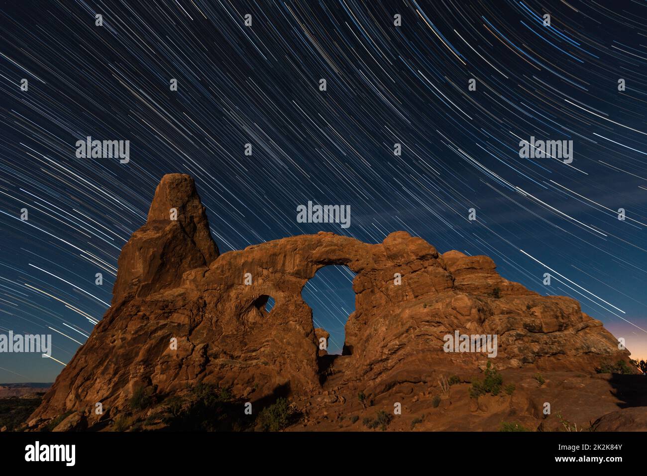 Star trails and clouds over Turret Arch with light painting in the ...