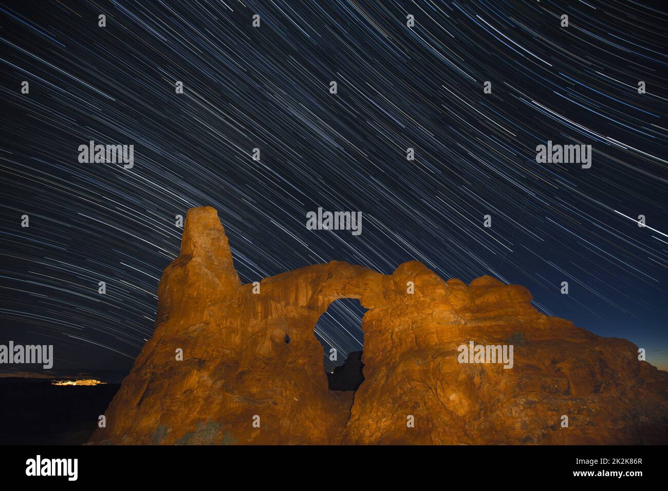 Star trails with a meteorite over Turret Arch with light painting in ...