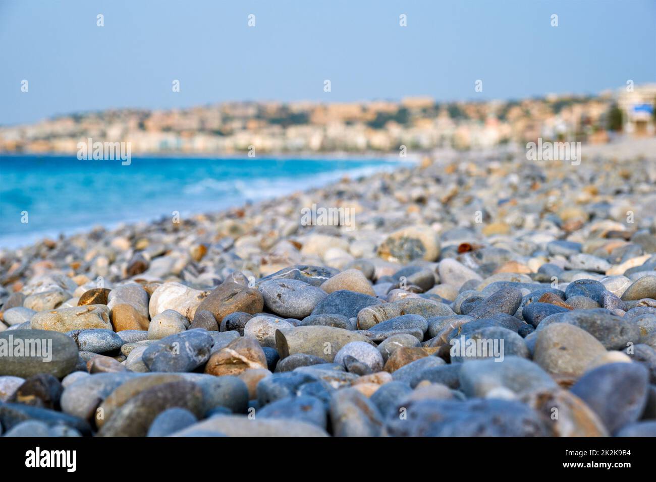 Beach with pebbles in the morning. Nice, France Stock Photo - Alamy