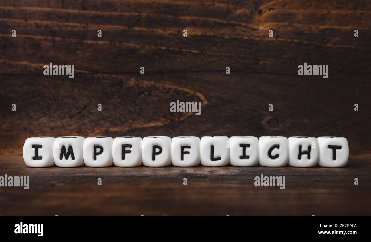 Corona virus Covid-19 vaccine text background in German Stock Photo - Alamy