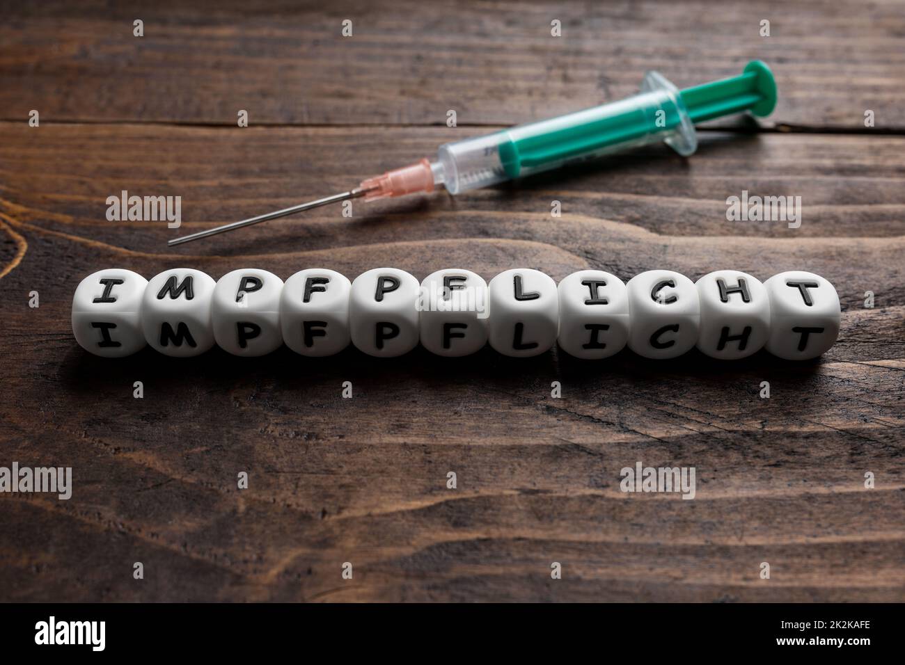 Corona virus Covid-19 vaccine text background in German Stock Photo - Alamy