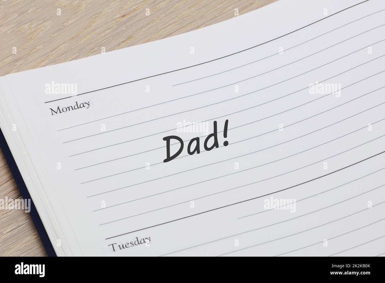 Dad reminder note in a diary page Stock Photo - Alamy