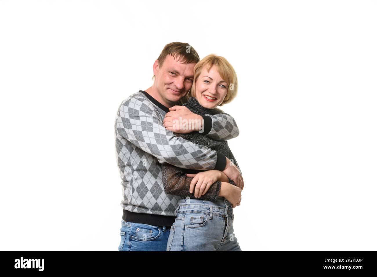 Man hugging woman, isolated on white background Stock Photo - Alamy