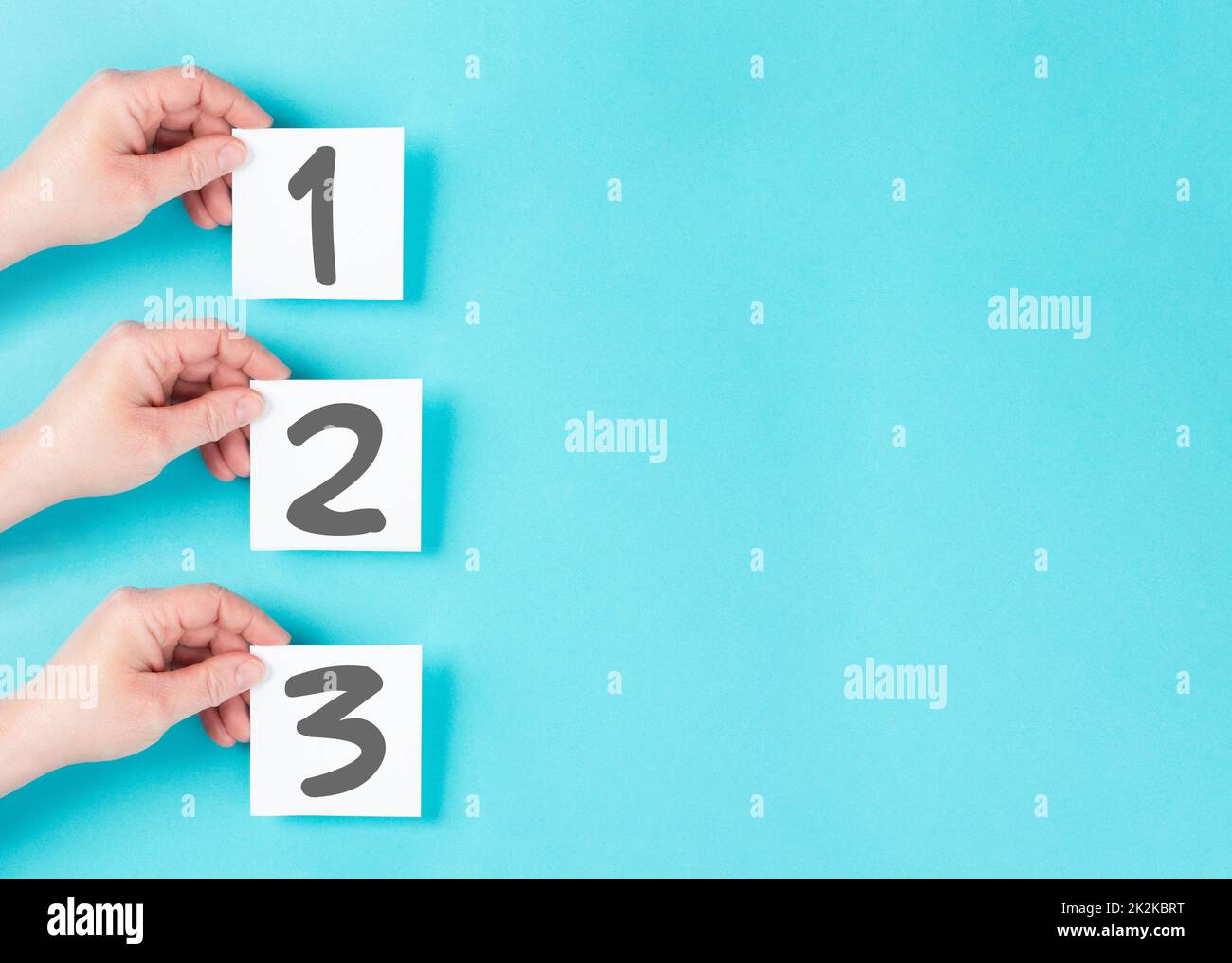 The numbers one, two and three are standing on paper, lesson and ...