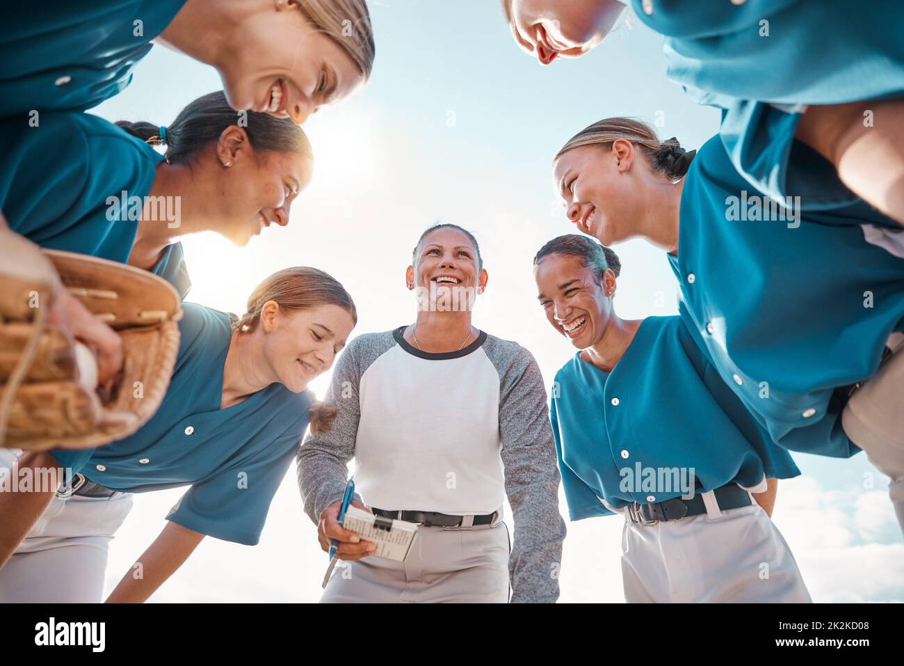 Women, baseball and team with coach smile, happy and support during ...