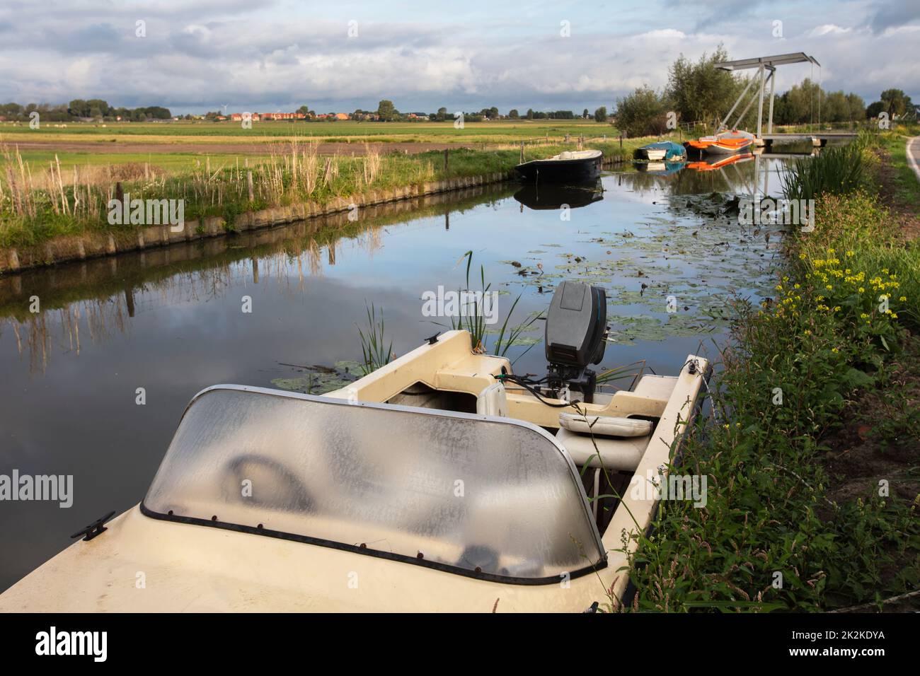 Boats moored at the waterfront in municipality Midden-Delfland in the ...