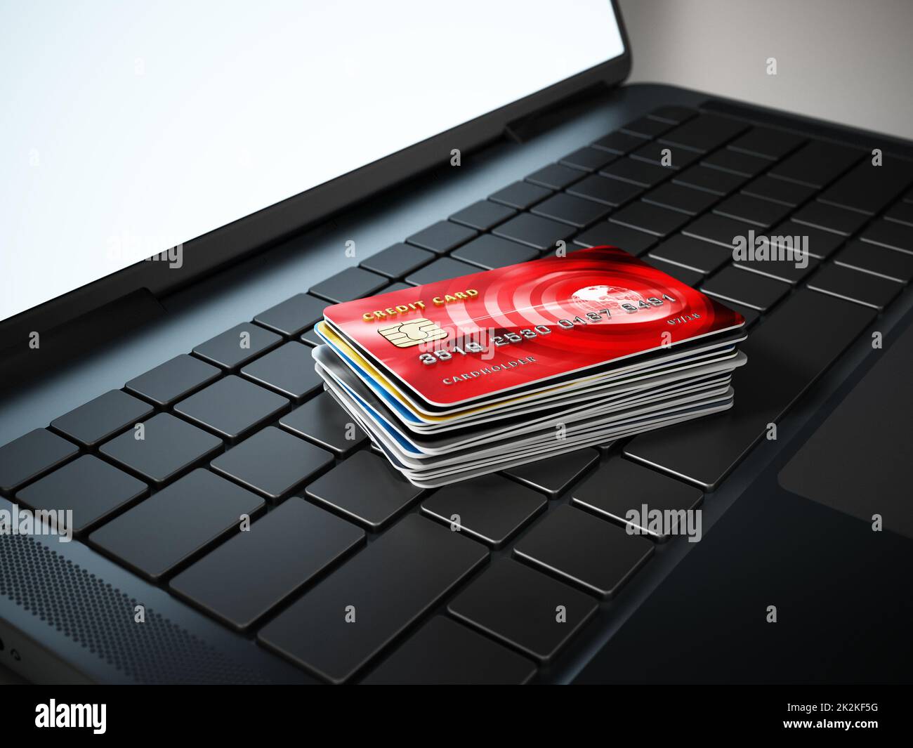 Credit cards standing on laptop computer keyboard. 3D illustration ...