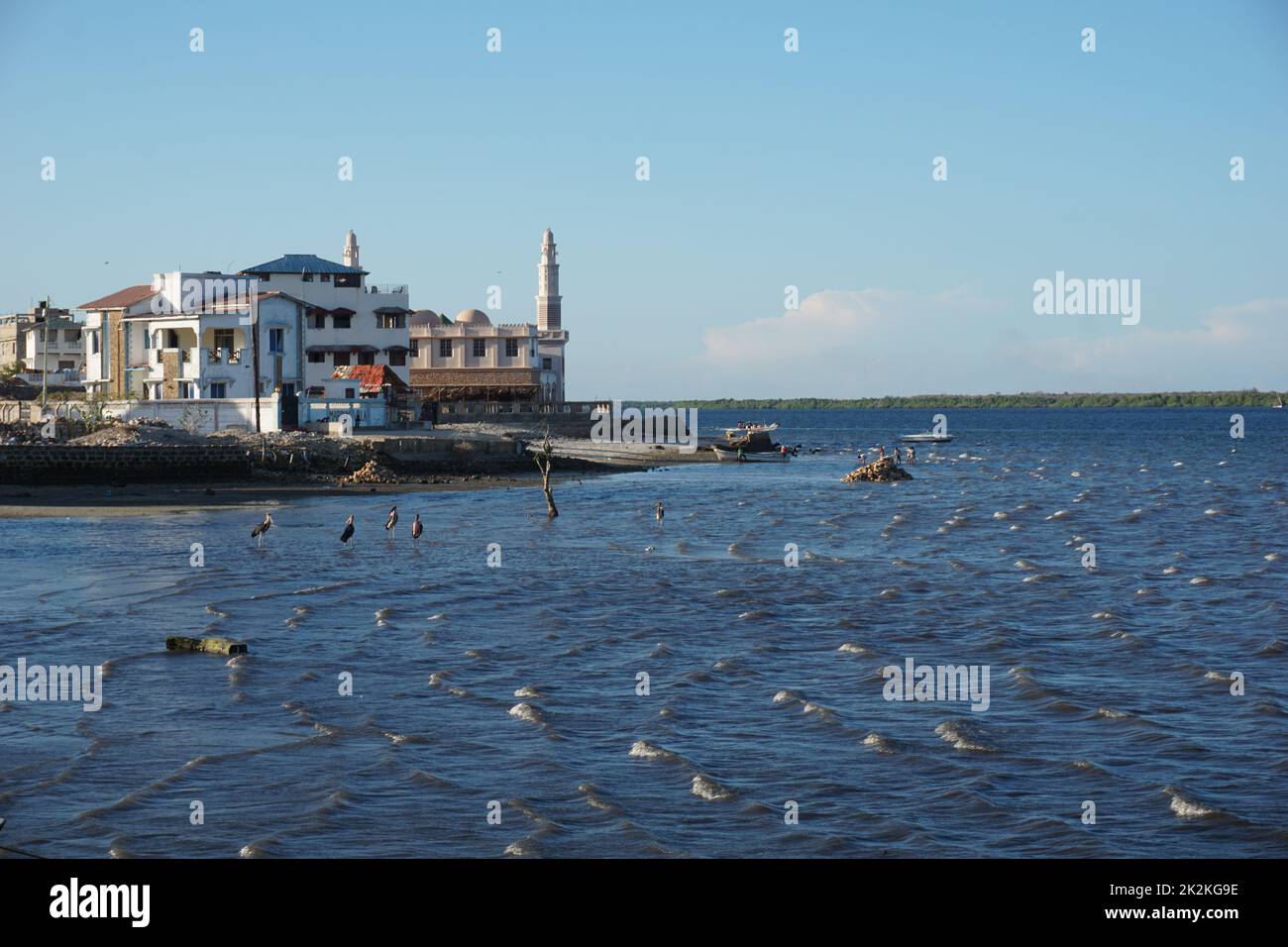 View form the harbour onto Masjid Madina Mosque, Lamu Stock Photo - Alamy
