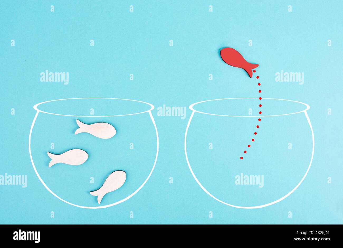 Red fish is the leader of the group, leadership and teamwork concept ...