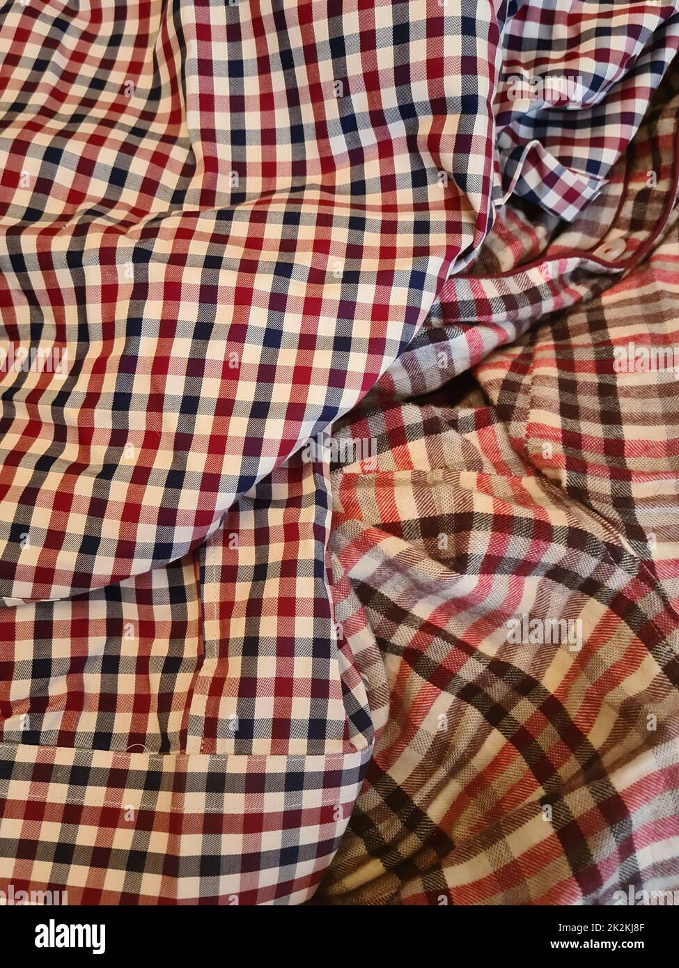 Patterns of similar but different plaid fabrics and with similar colors ...