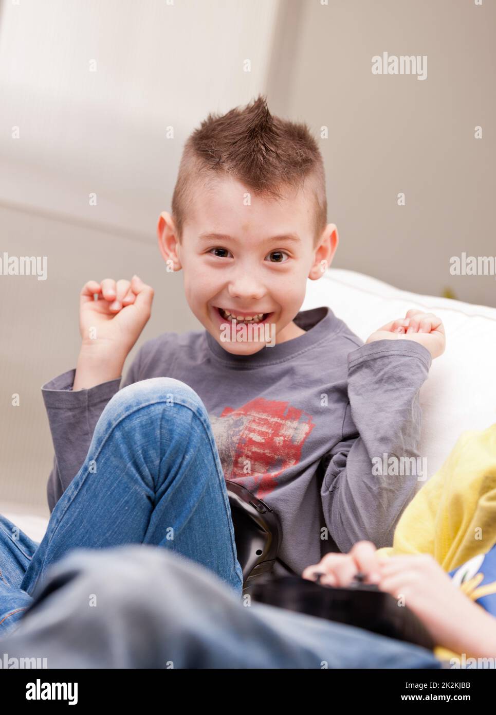 Little boy playing video games Stock Photo - Alamy