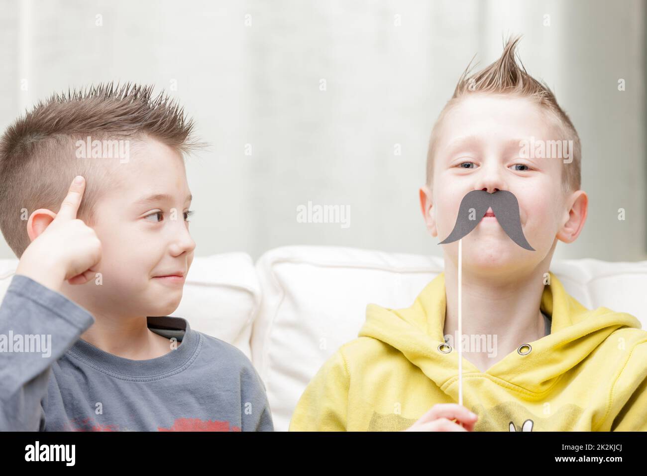 couple of little brothers making funny faces Stock Photo - Alamy