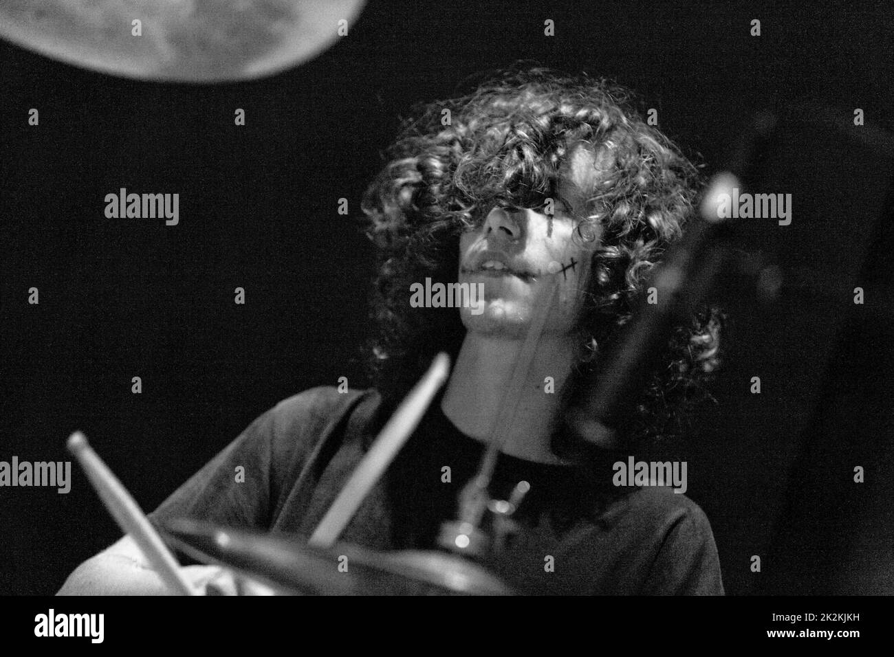 Young drummer boy live on stage Stock Photo - Alamy